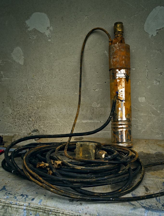Old Rusty Submersible Pump for Drinking Water Stock Photo - Image of ...