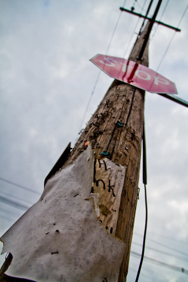 Old Rusty Telephone Line with Stop Sign Stock Image - Image of historic ...