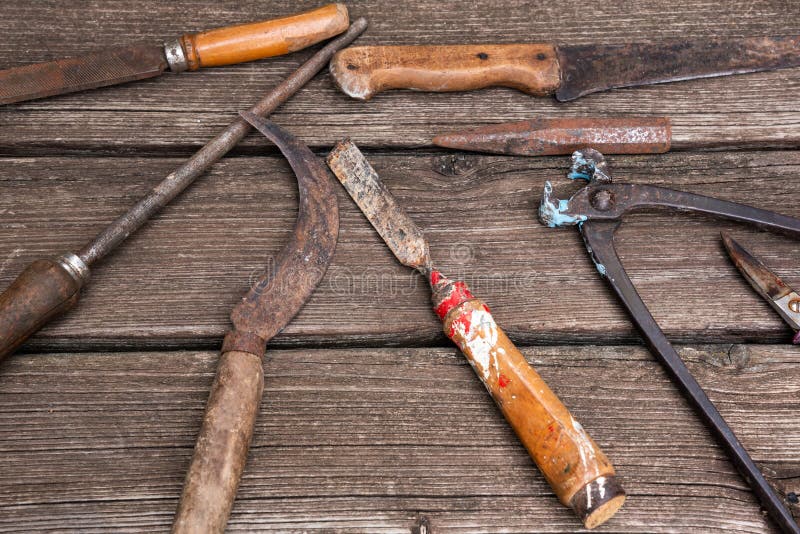Old Rusty Tools on Wooden Surface Stock Photo - Image of manual, wooden ...