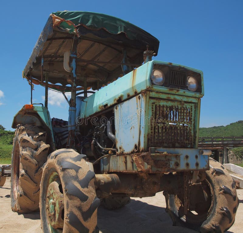 Old Rusty Tractor stock photo. Image of worn, motor, sand - 15663954