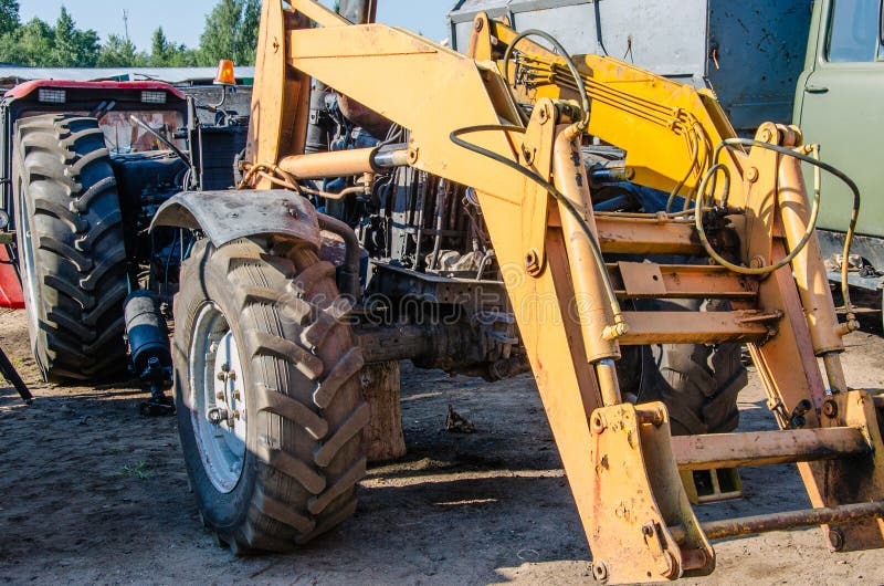 Old Rusty Tractor`s Flat Back Tire. Industrial Stock Photo - Image of ...