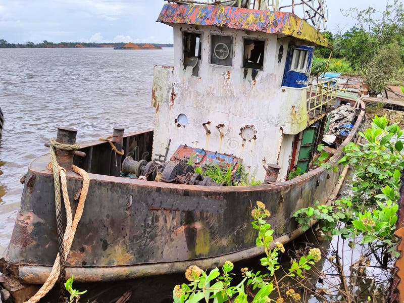 Old Rusty Tugboat at Dock stock photo. Image of ocean - 44276134