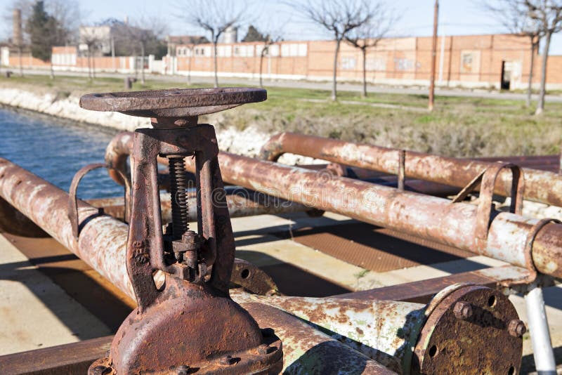 Old rusty valves stock image. Image of refinery, engineering - 84988491