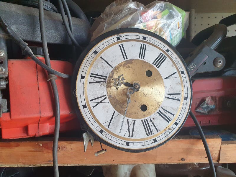 Old Rusty Vintage Clock on a Shelf in a Workshop. Stock Photo - Image ...