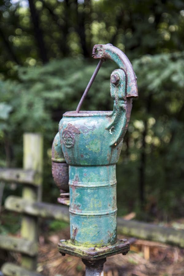 Old Rusty Water Pump in the Forest Stock Image - Image of drink, nature ...