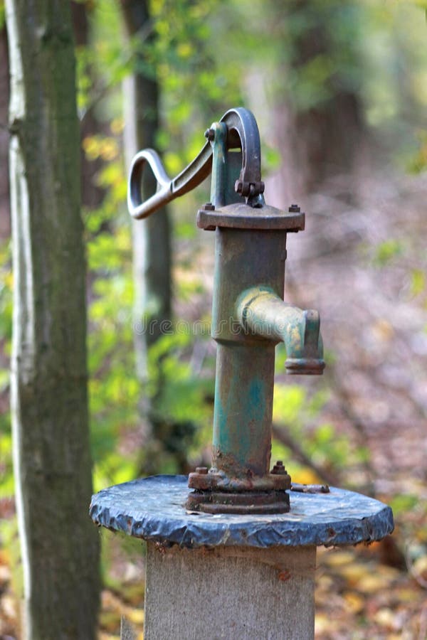 Old rusty water pump stock photo. Image of ruin, green - 9164936