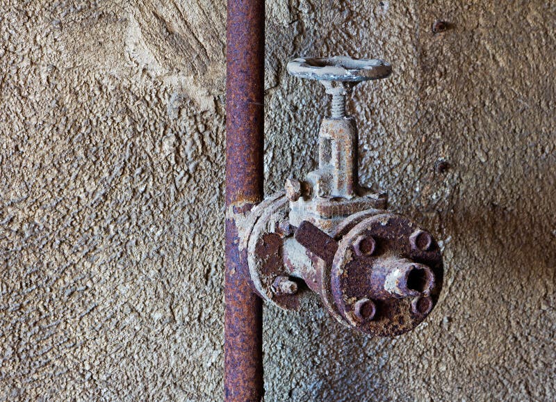 Old Rusty Water Tap in Concrete Wall Stock Photo - Image of wall, brown ...