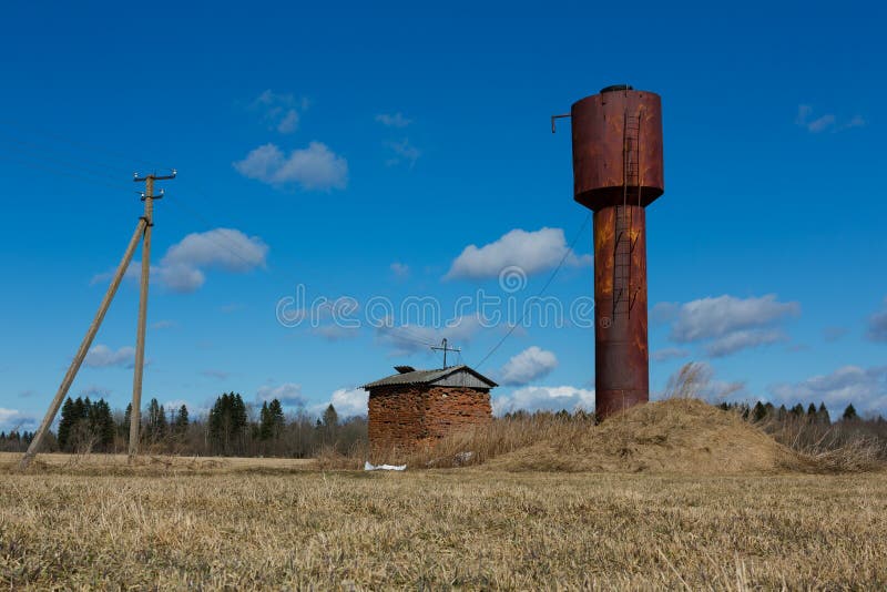 Old rusty water tower stock photo. Image of structure - 100480040