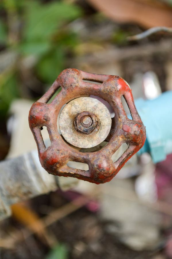 Old Rusty Water Valve in Garden Stock Photo - Image of tube, garden ...