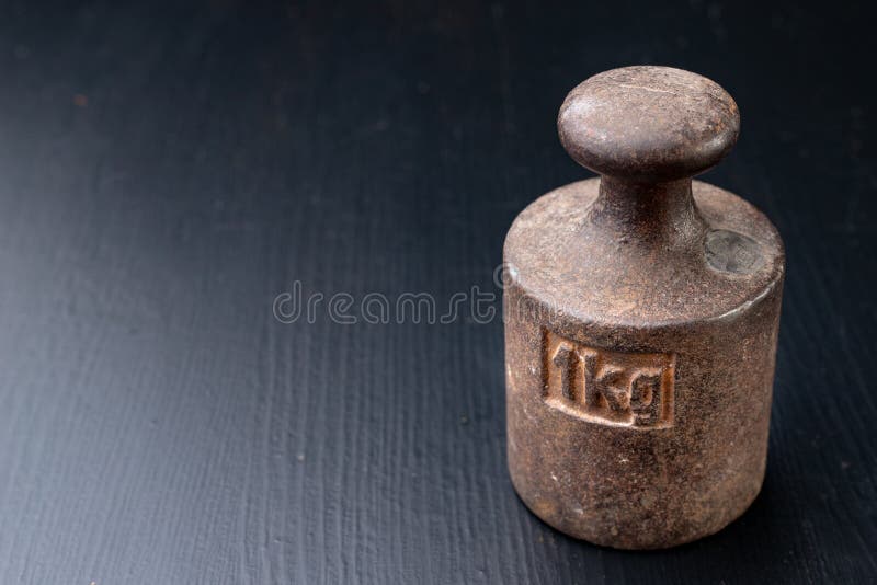 Old Rusty Weights on a Dark Table. Accessories for Weighing Products ...
