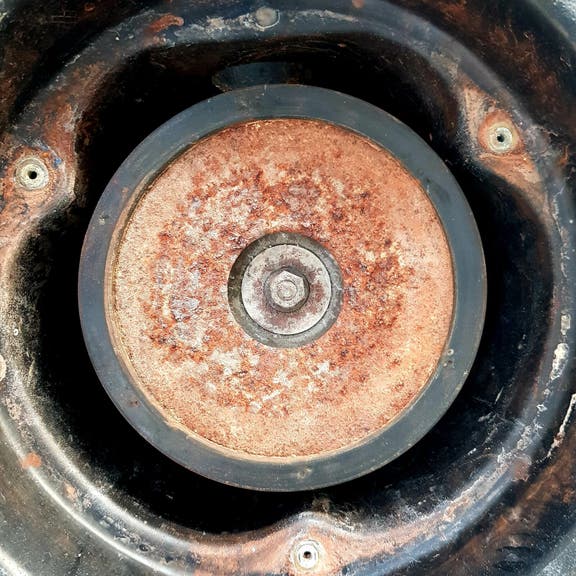 Old Rusty Wheel of a Car. Abstract Background and Texture for Design ...