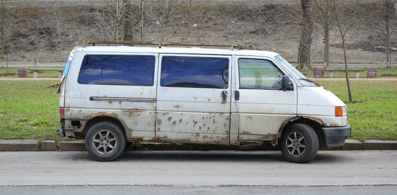 Old Rusty White Minivan Parked on the Road Stock Image - Image of city ...