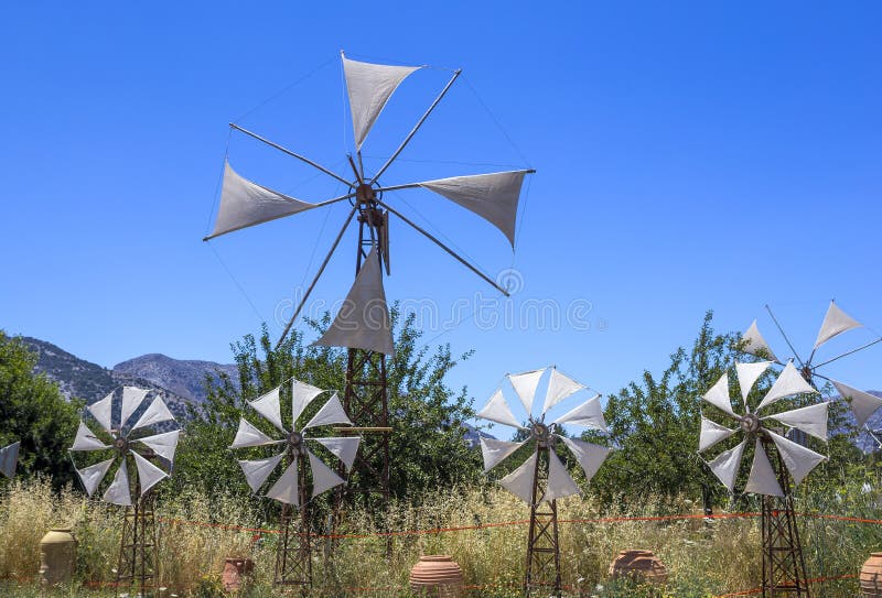 Old Rusty Windmills on the Field. Agriculture in Greece Stock Image ...