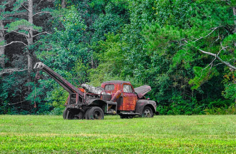 Old Rusty Wrecker in Field stock image. Image of abandoned - 196906603