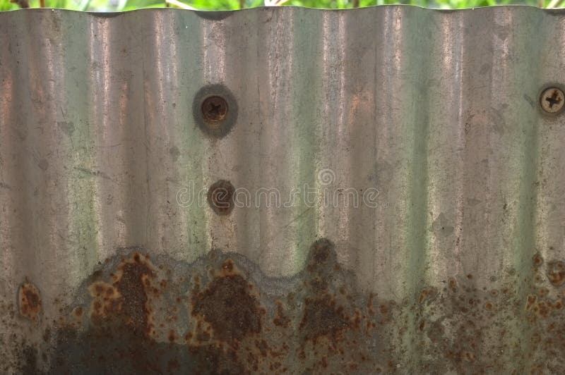 Old Rusty Zinc Industrial Wall with Nut Texture Background Stock Photo ...