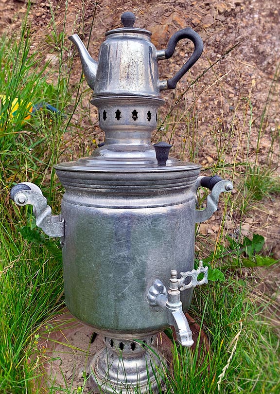 An old samovar and kettle. stock image. Image of hotel - 329159939