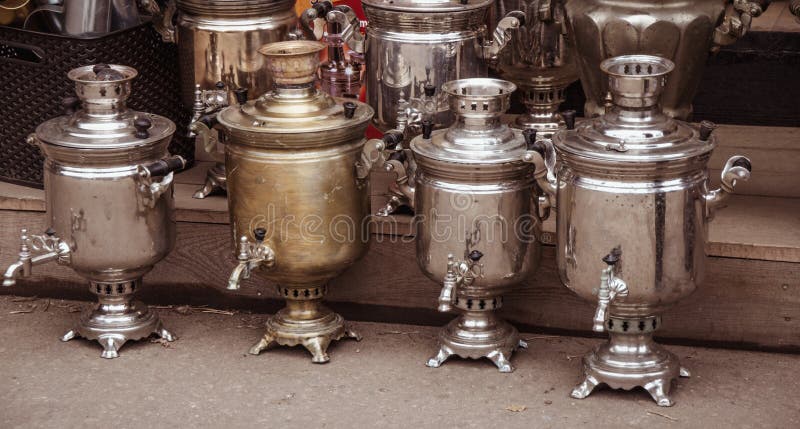 Old samovars in row. stock image. Image of shopping - 236017985