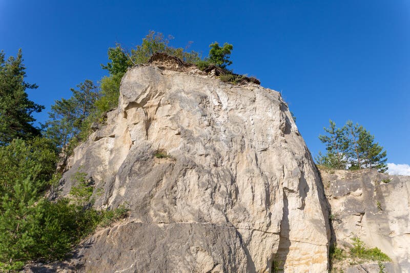 An Old Sandstone Quarry Covered with Trees Stock Image - Image of ...