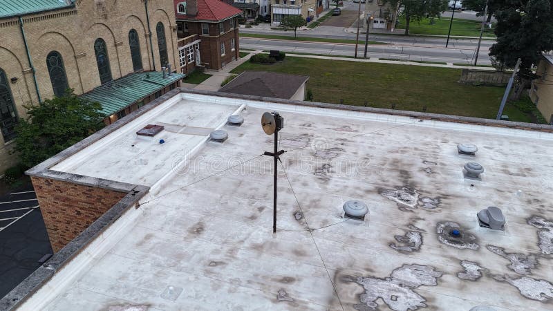 Old Satellite Dish Gold on Top of Rustic Building with Guy Wire Cables ...