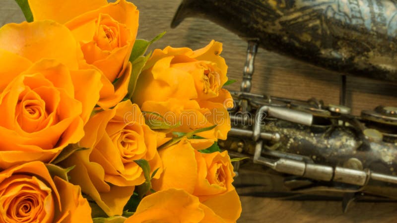 Old saxophone with roses stock photo. Image of saxophone - 88805424
