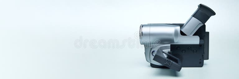 Old-school Video Camcorder with Flip Screen Open, Placed on Light Blue ...