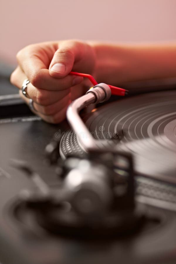 Old School Vinyl. Closeup of a Djs Hand Putting on a Record. Stock ...