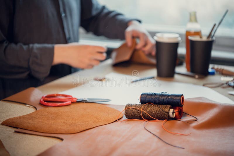 Old School Workshop of an Exclusive Shoemaker. Spools of Thread on the ...