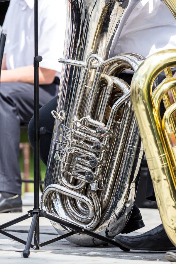 Old scratch tuba stock image. Image of hand, sunlight - 37926701