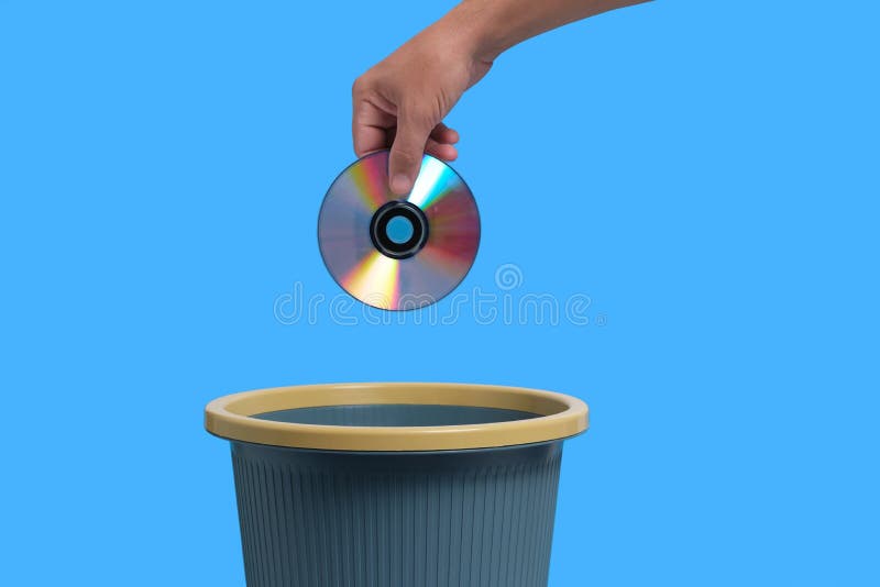 Old Scratched CD is Thrown into the Trash on a Blue Background.Outdated ...