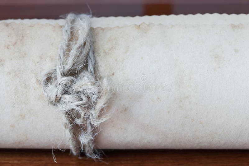 Old Scroll Paper on Wooden Background. Close Up of Rope Stock Image ...