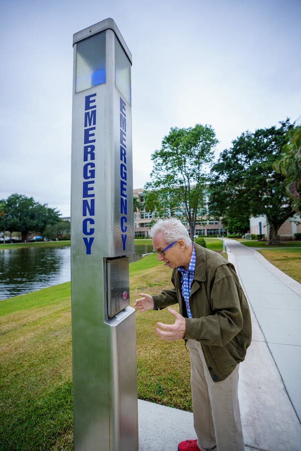 Old Senior Man Calling for Help at a Public Safety Beacon Emergency ...