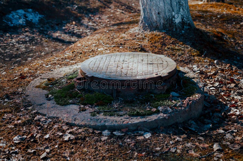 Old Sewer Manhole with Cover Stock Photo - Image of manhole, rusty ...