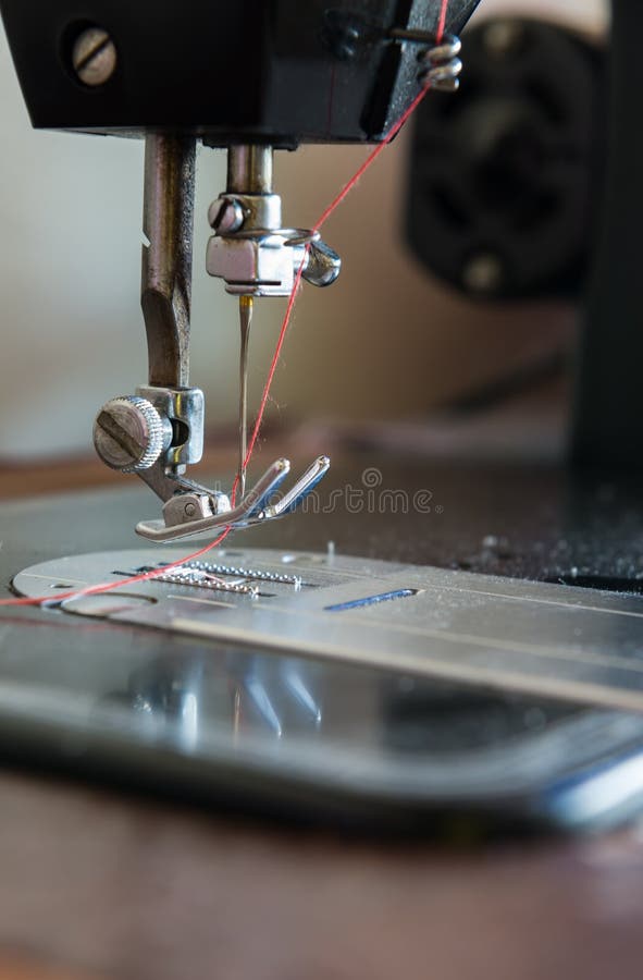 Old sewing machine needle stock photo. Image of seam - 58203110
