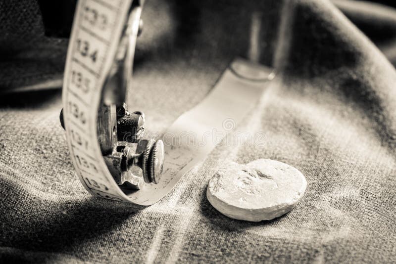 Old Sewing Machine with Tailor Tape, Scissors and Threads Stock Photo ...