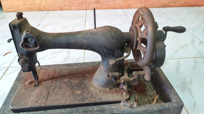 An Old Sewing Machine that is Worn Out and Broken Stock Photo - Image ...