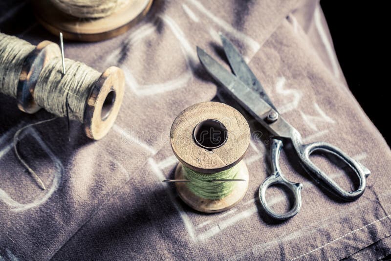 Old Sewing Table with Scissors, Cloth and Threads Stock Image - Image ...