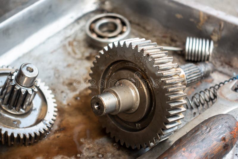 Old Shiny Motorcycle Gears. Disassembly of the Engine Stock Photo ...