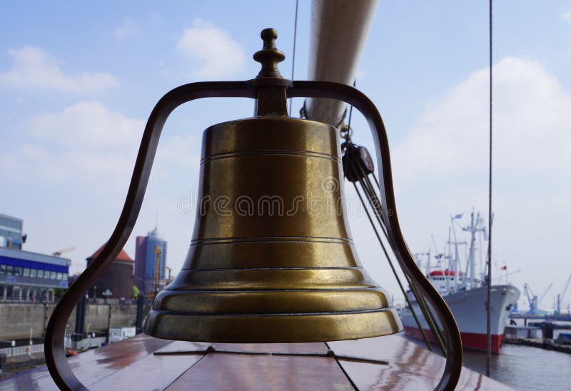 Old ship`s bell stock photo. Image of brass, mizenmast - 81464584