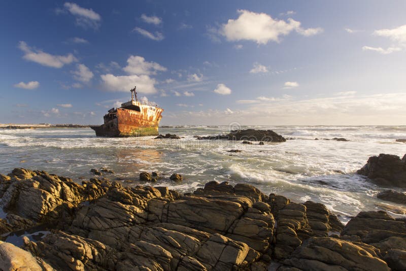 Old Shipwreck Long Exposure on the Rocks Sunset Stock Image - Image of ...