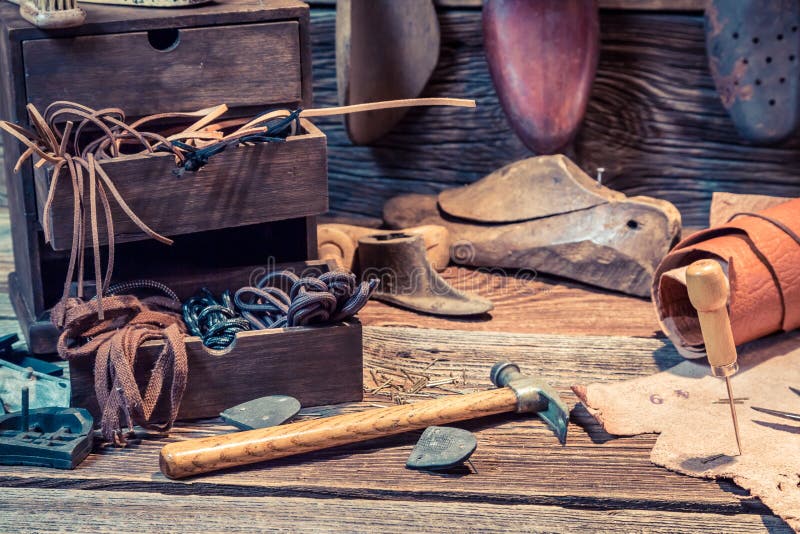 Vintage Shoemaker Workshop with Leather and Tools Stock Image - Image ...