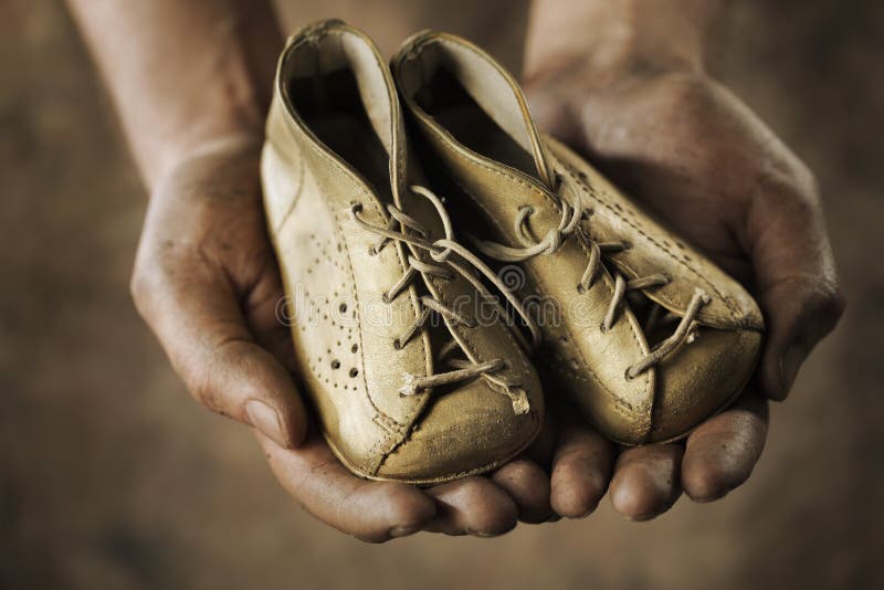 Old shoes stock photo. Image of childhood, hands, holding - 11392898