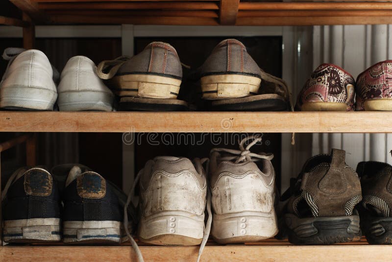 Old shoes on rack stock photo. Image of worn, grunge, sneaker - 8845628