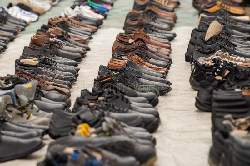 Old shoes on Sunday fair editorial image. Image of bunch - 140832000