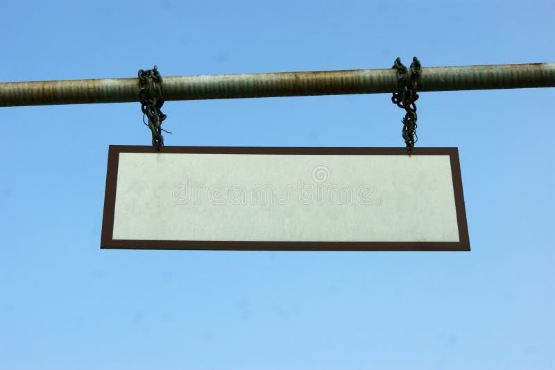 Old Sign Hanging Off of a Pipe Stock Photo - Image of information ...