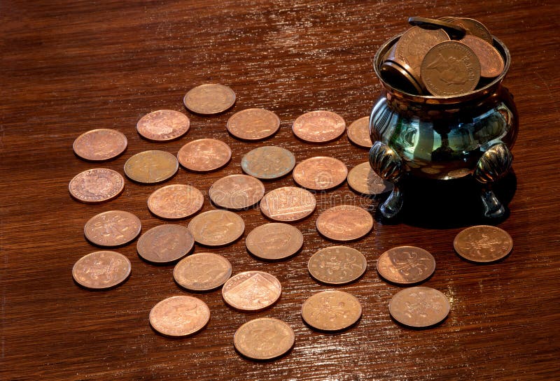 Old Silver Pot and Copper Coins on a Polished Wooden Surface Stock ...