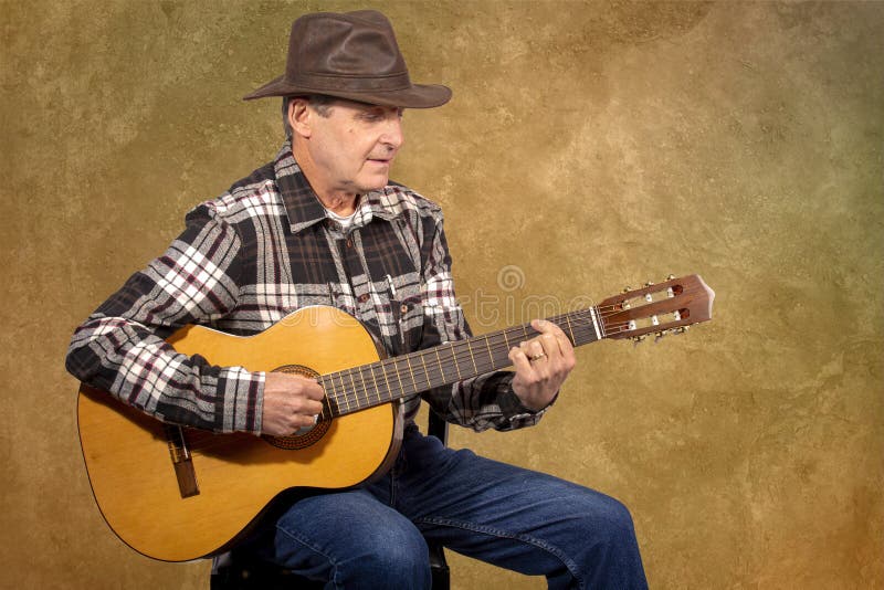Old singer with his guitar stock photo. Image of music - 198931604
