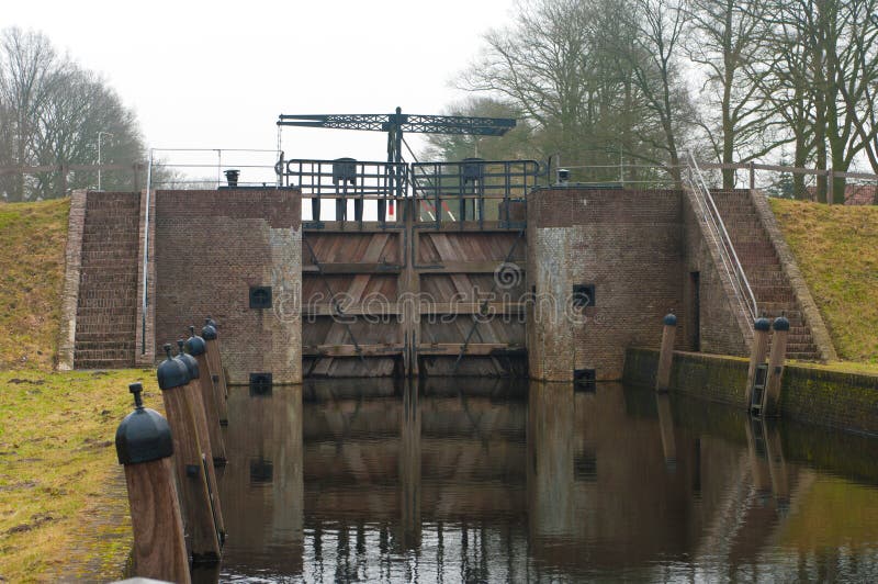 Old sluice door stock image. Image of outdoors, quayside - 24397113