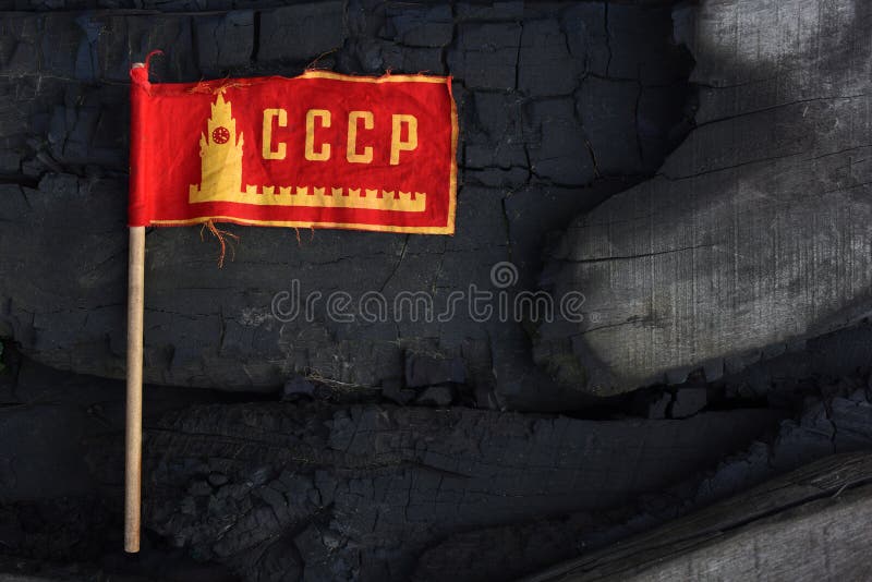 The Old Small Flag of the Soviet Union on Burnt Boards. Stock Photo ...