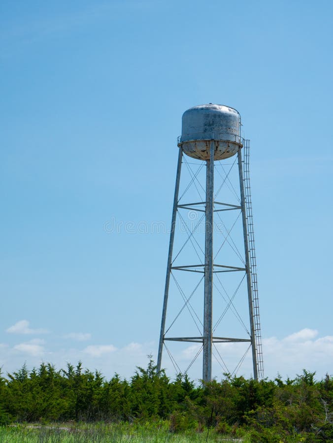 Old Small Town Water Tower, Lit by Sunlight from the Left Side and Set ...