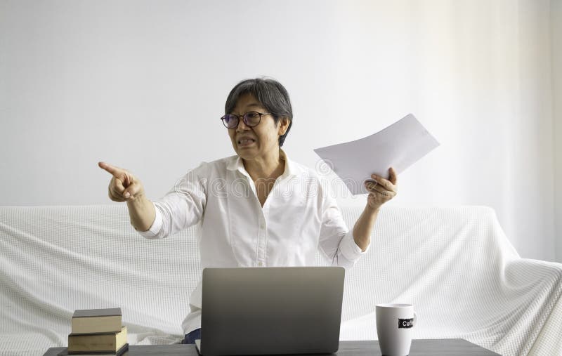 Old Smart Lady Using Laptop for E-learning at Living Room Stock Image ...